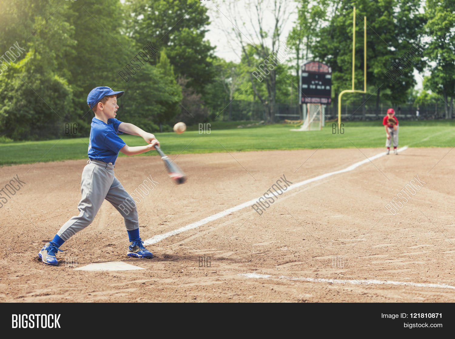 Boy Hitting Baseball Image Photo Free Trial Bigstock