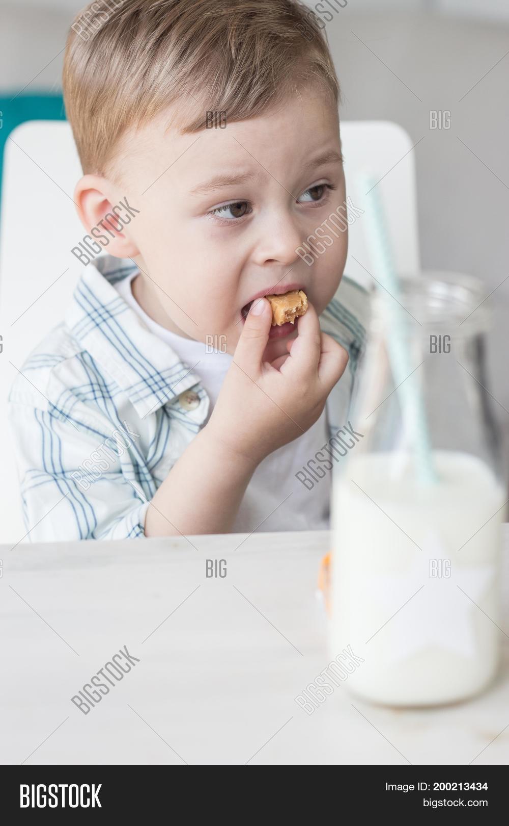 Cute Little Boy Eating Image & Photo (Free Trial) | Bigstock