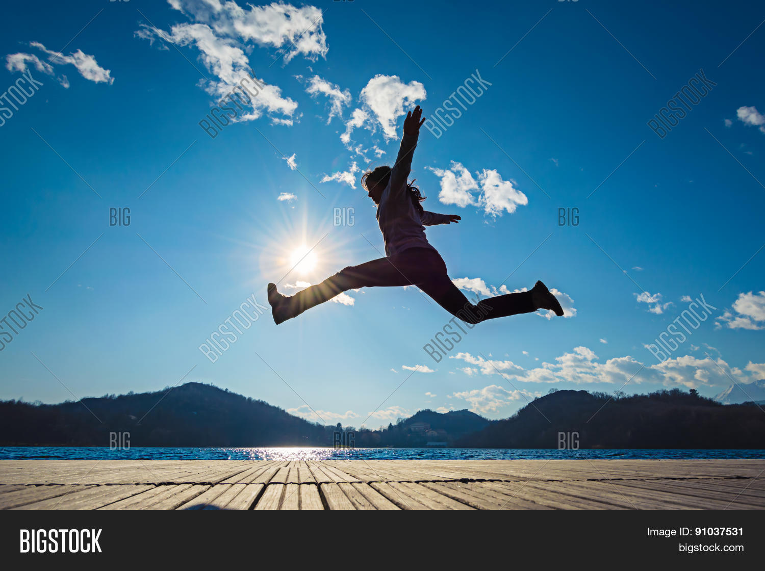 Girl Jumping Sun Image & Photo (Free Trial) | Bigstock