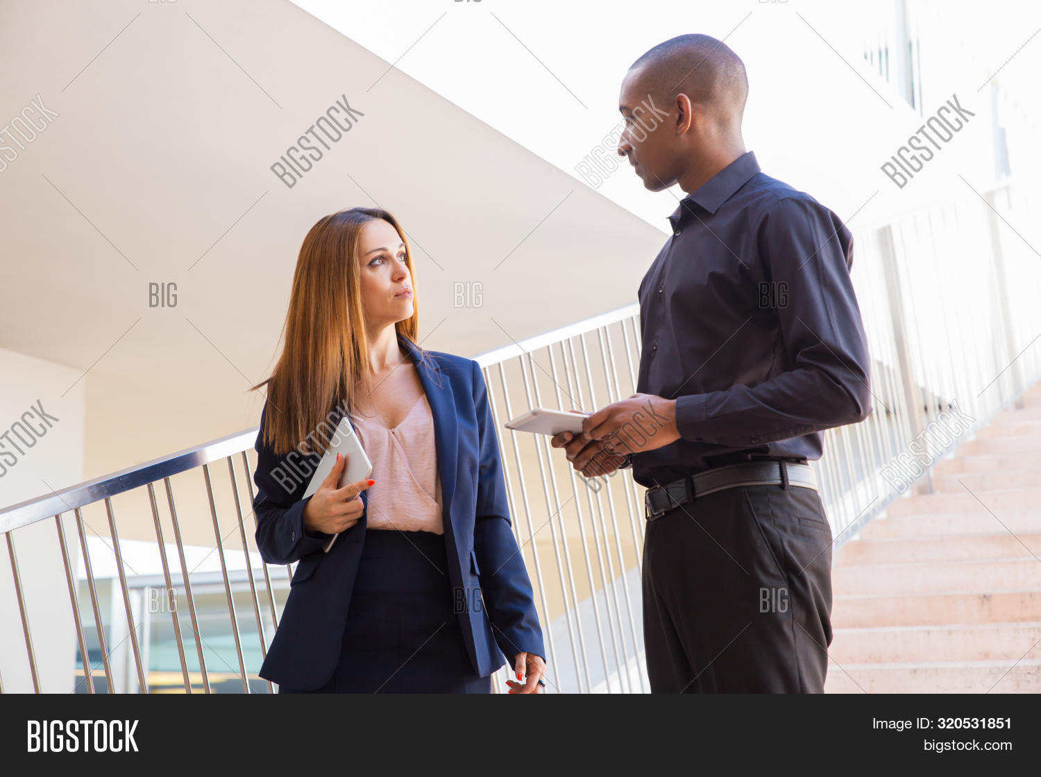 Serious Coworkers Image & Photo (Free Trial) | Bigstock