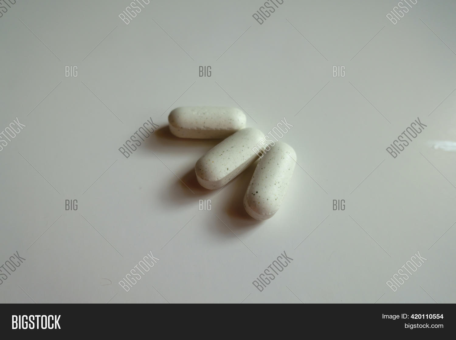 Three White Caplets Image & Photo (Free Trial) | Bigstock