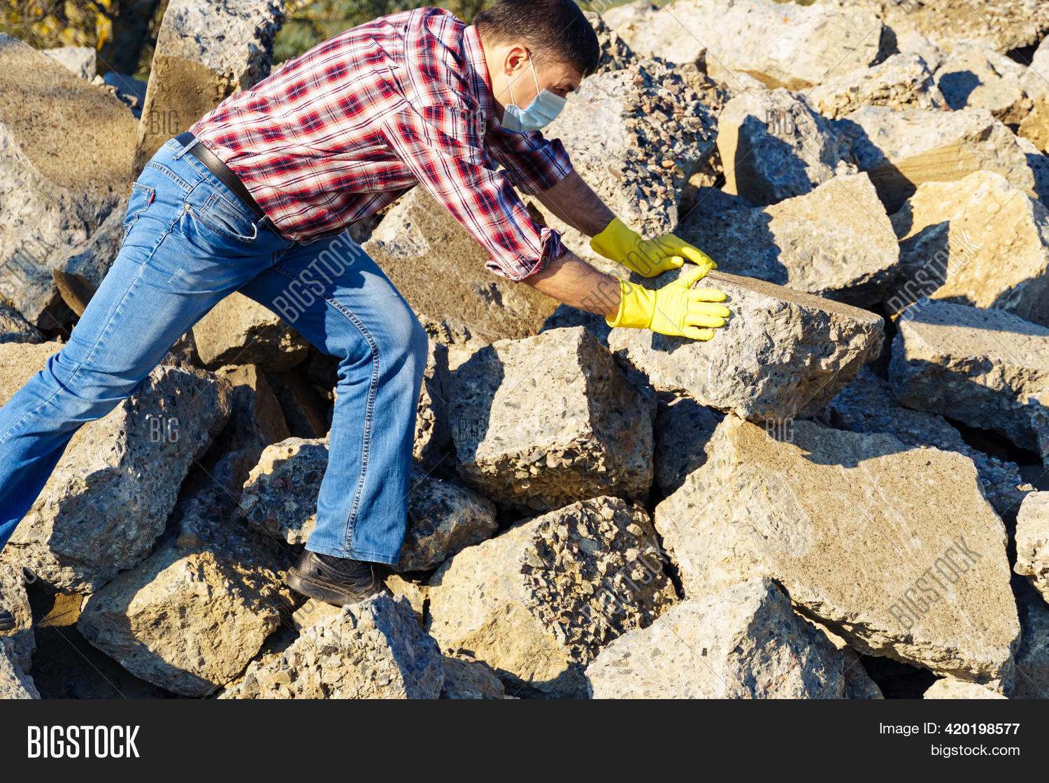 Man Works Pile Stones Image & Photo (Free Trial) | Bigstock