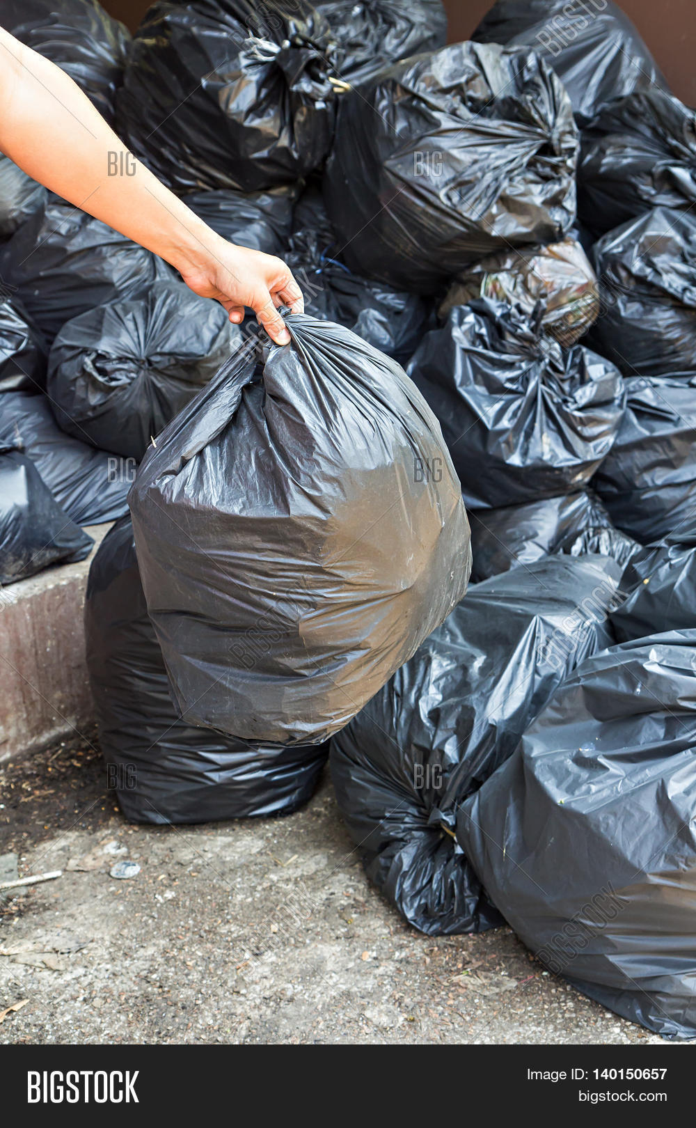 Hand Carrying Garbage Image & Photo (Free Trial) | Bigstock