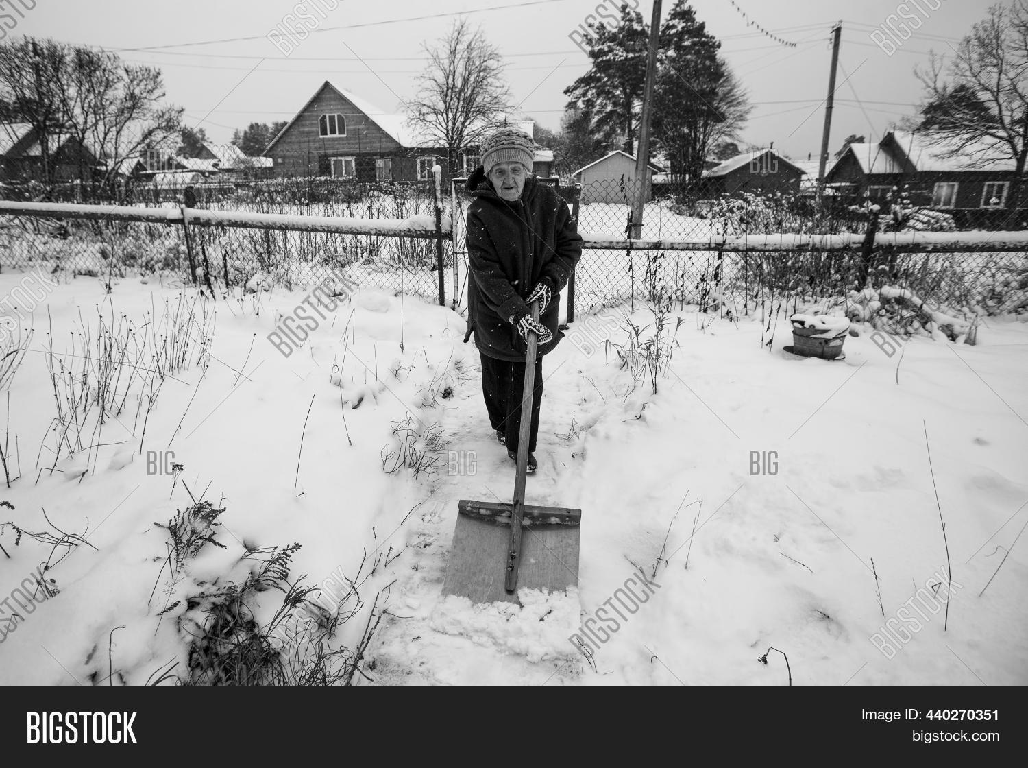 Old Woman Shoveling Image & Photo (Free Trial) | Bigstock