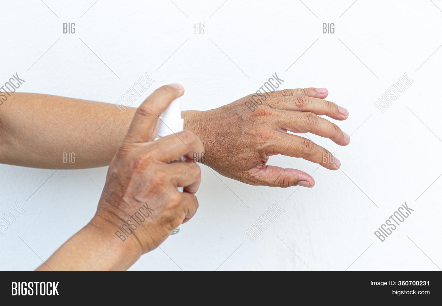 Men Use Alcohol Spray Image & Photo (Free Trial) | Bigstock