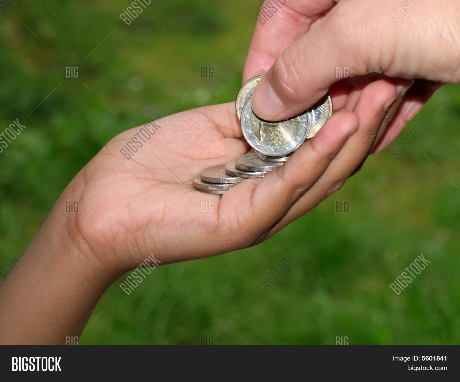 Hand Giving Coins