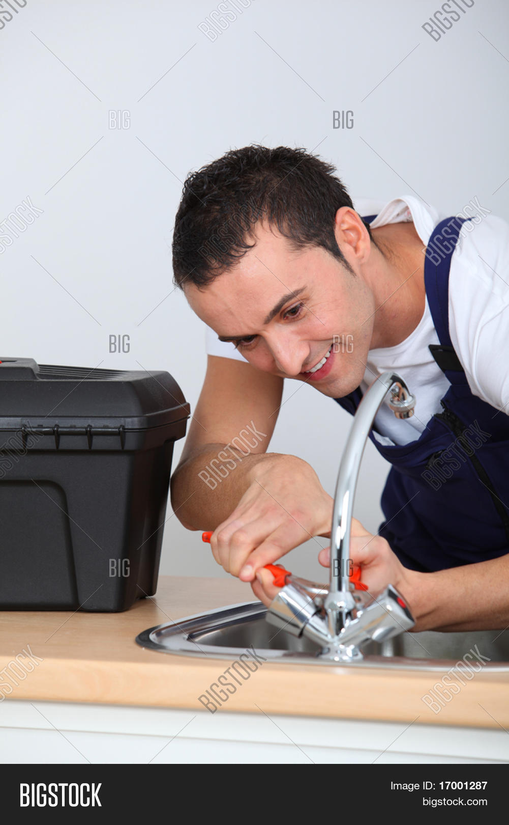 Young Man Fixing Sink Image & Photo (Free Trial) | Bigstock