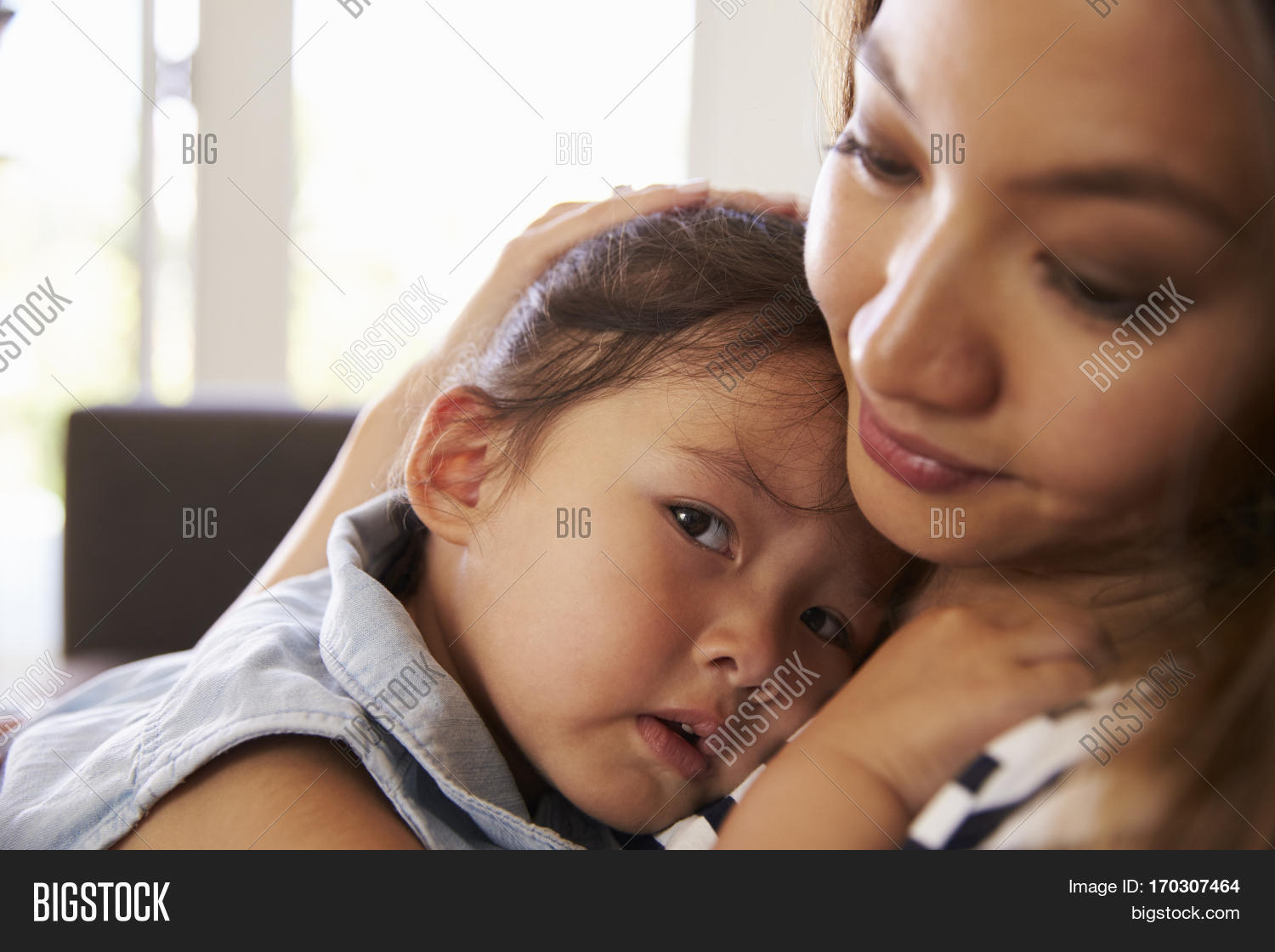 Mother Cuddling Image & Photo (Free Trial) | Bigstock