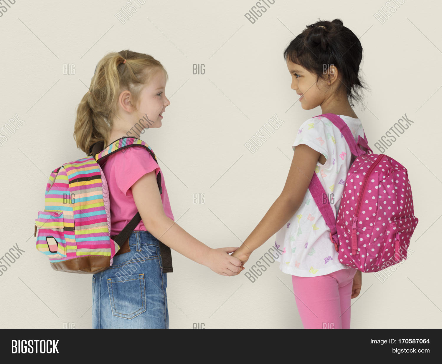 Little Girls Holding Image & Photo (Free Trial) | Bigstock