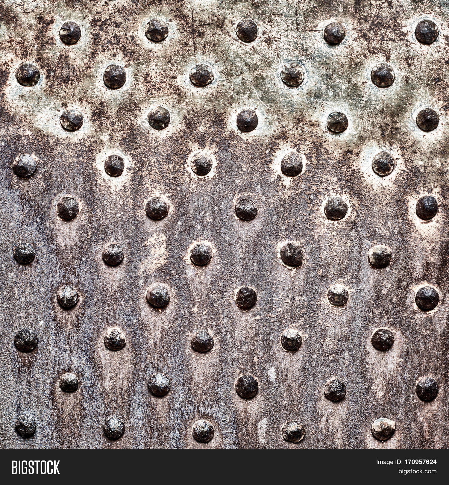 Rusted Metal Plate With Rivets