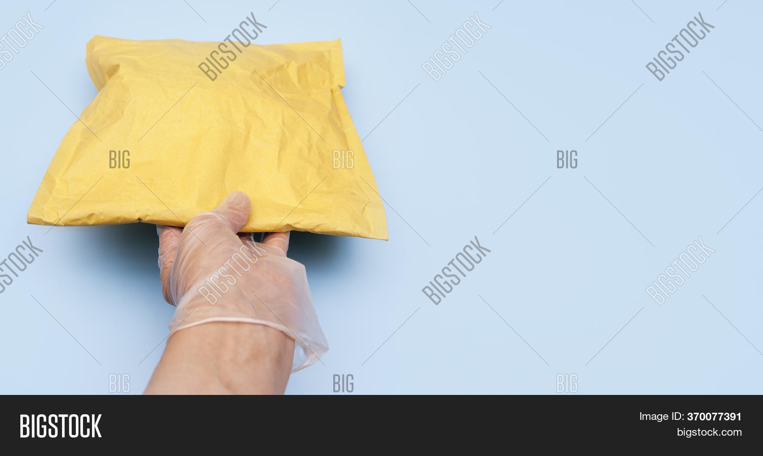 Gloved Hand Holds Image & Photo (Free Trial) | Bigstock
