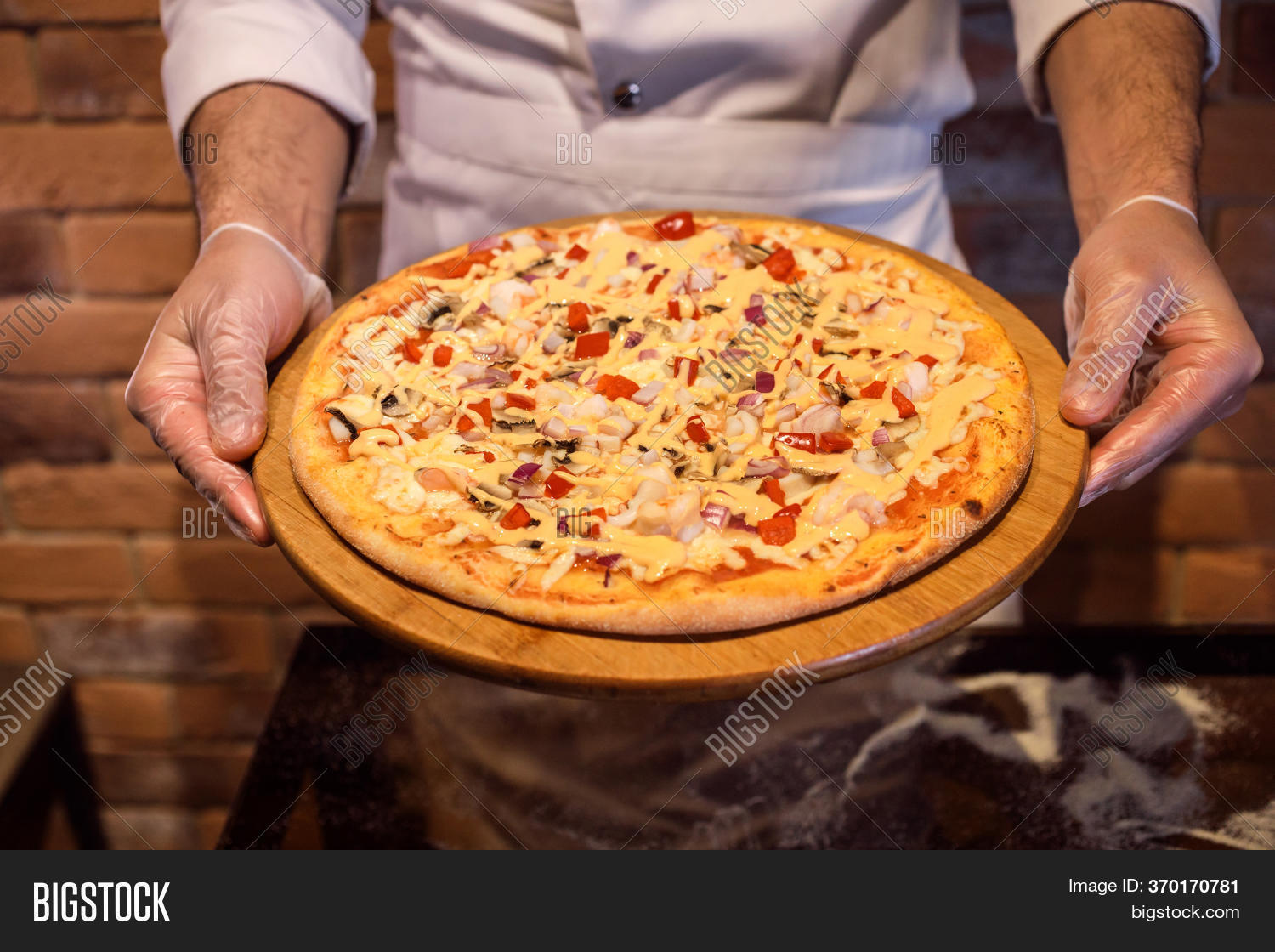 Chef Gloves Holds Image & Photo (Free Trial) | Bigstock