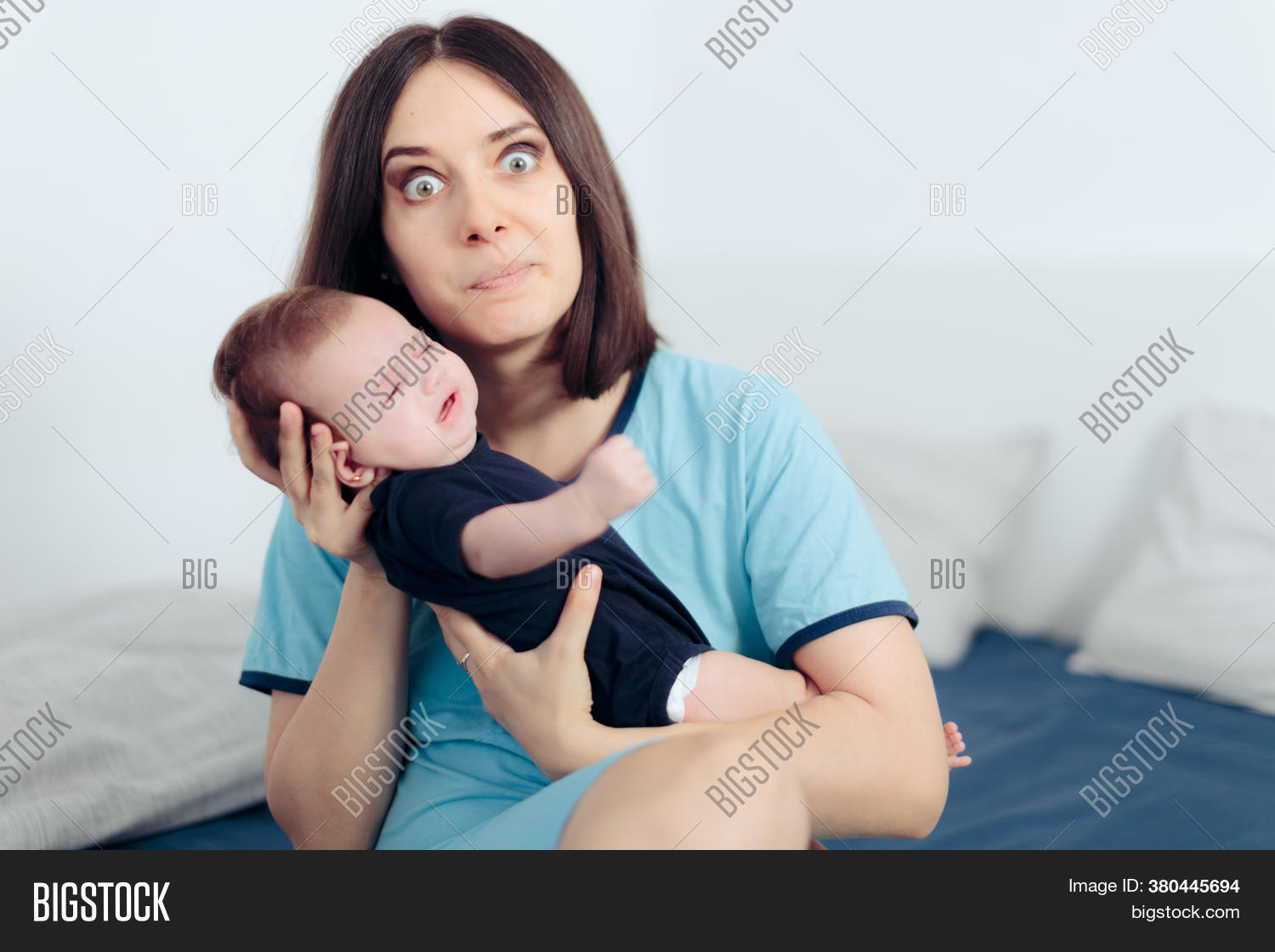 Stressed Mom Holding Image & Photo (Free Trial) | Bigstock