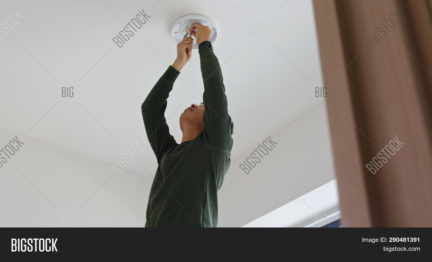 Man Install Lamp Onto Image & Photo (Free Trial) | Bigstock