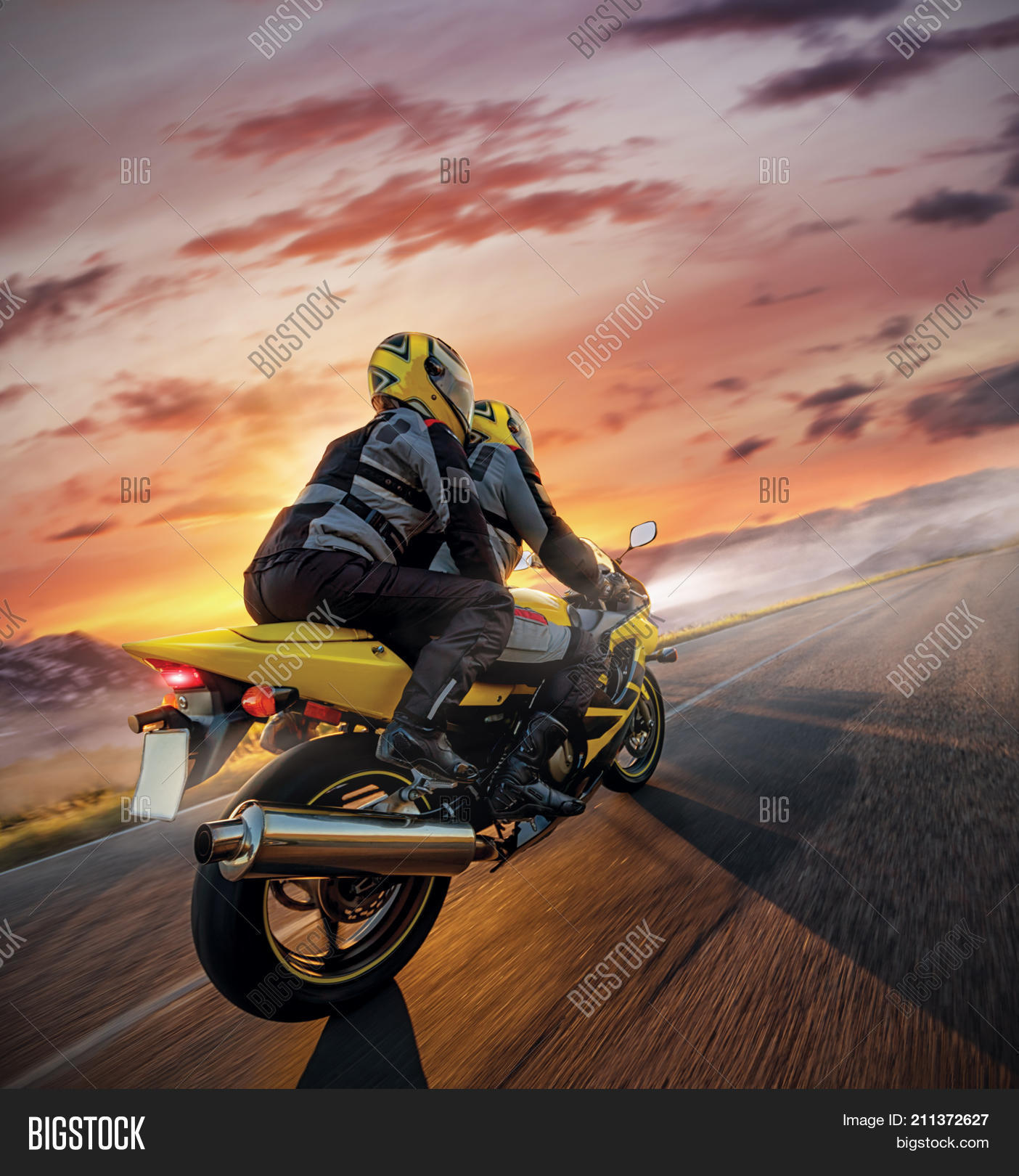 Motorcycle Riding Into Sunset