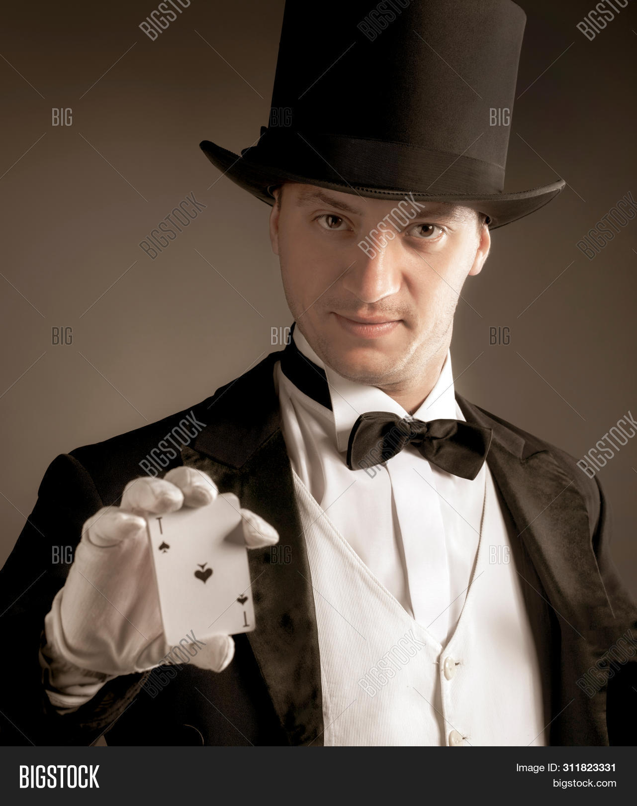 Magician Holding Cards