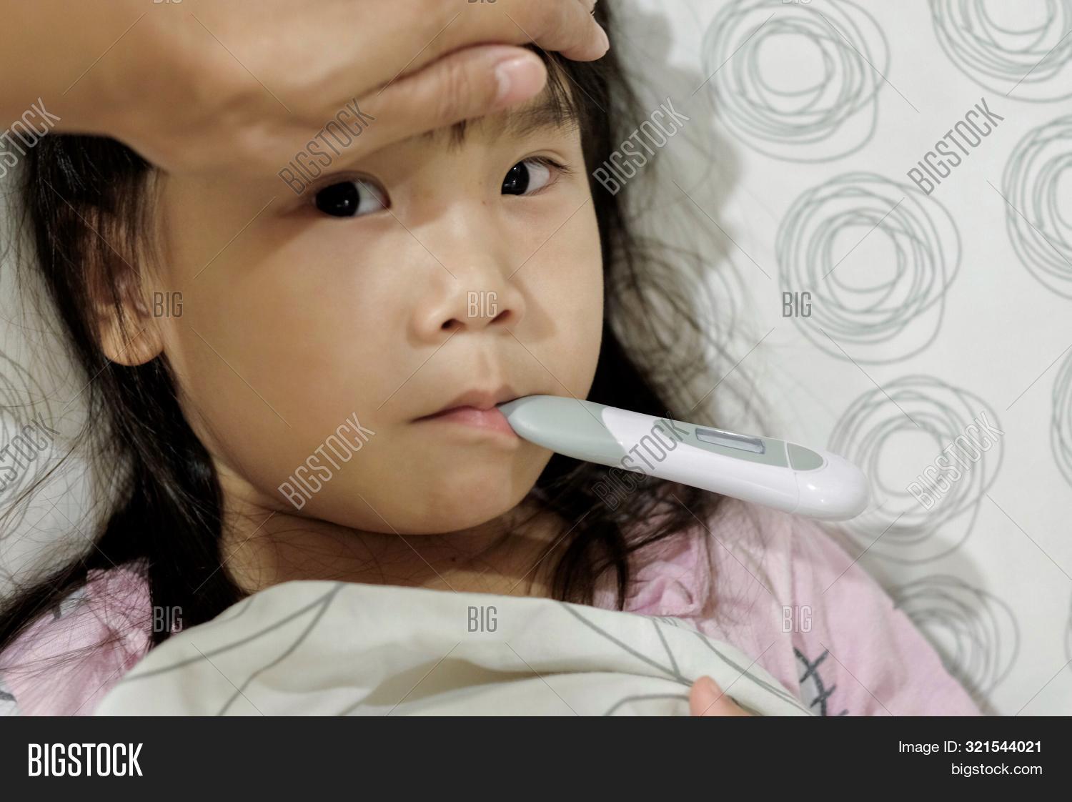 Asian Child Girl Sick Image & Photo (Free Trial) | Bigstock