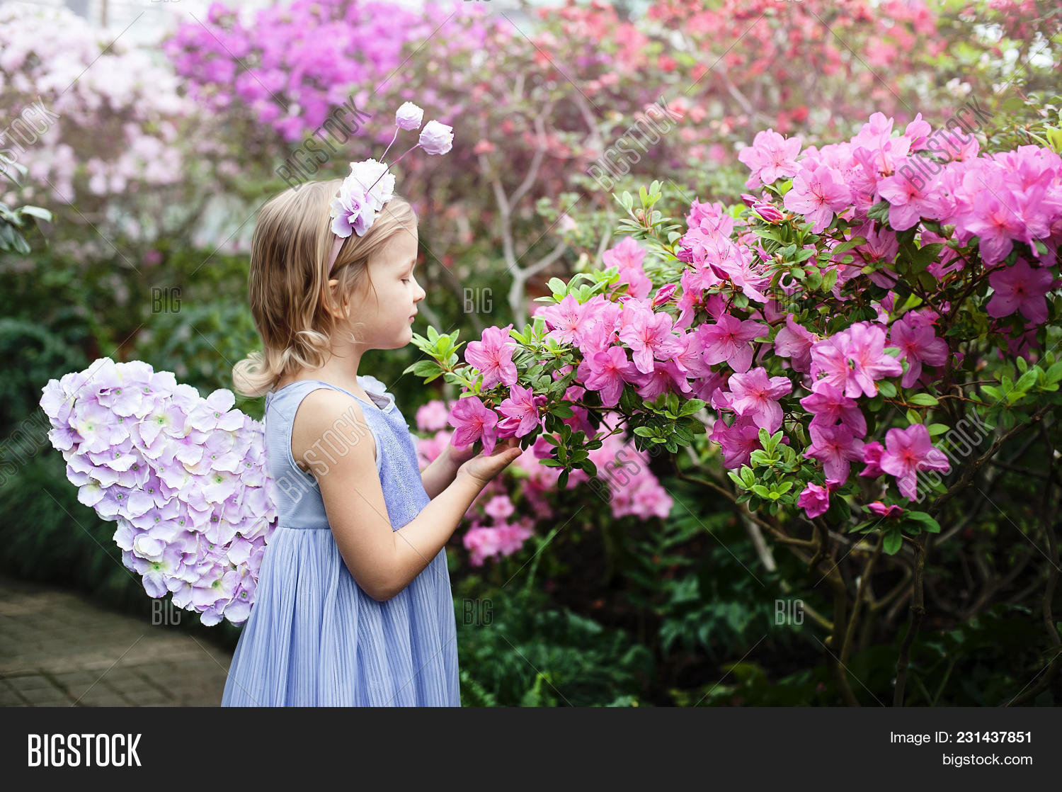 Girl Sniffing Flowers Image & Photo (Free Trial) | Bigstock