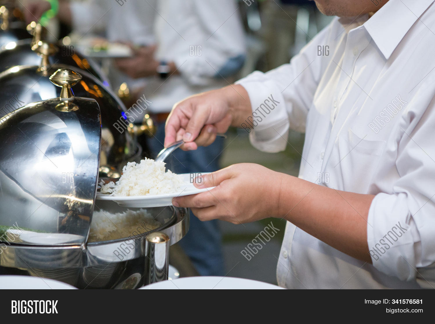 Imagen y foto Man Scooping Food (prueba gratis) | Bigstock