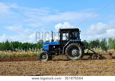 Blue Tractor Field Image & Photo (Free Trial) | Bigstock