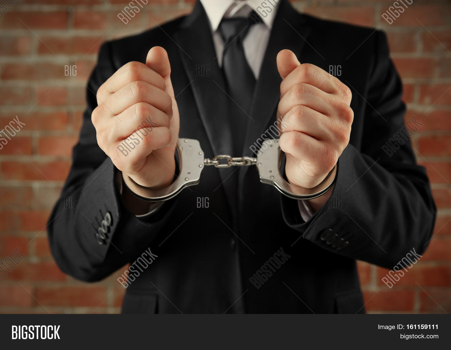 Man Handcuffs On Brick Image & Photo (Free Trial) | Bigstock