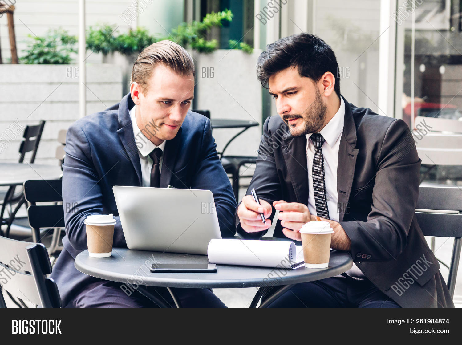 Two Businessman In Office