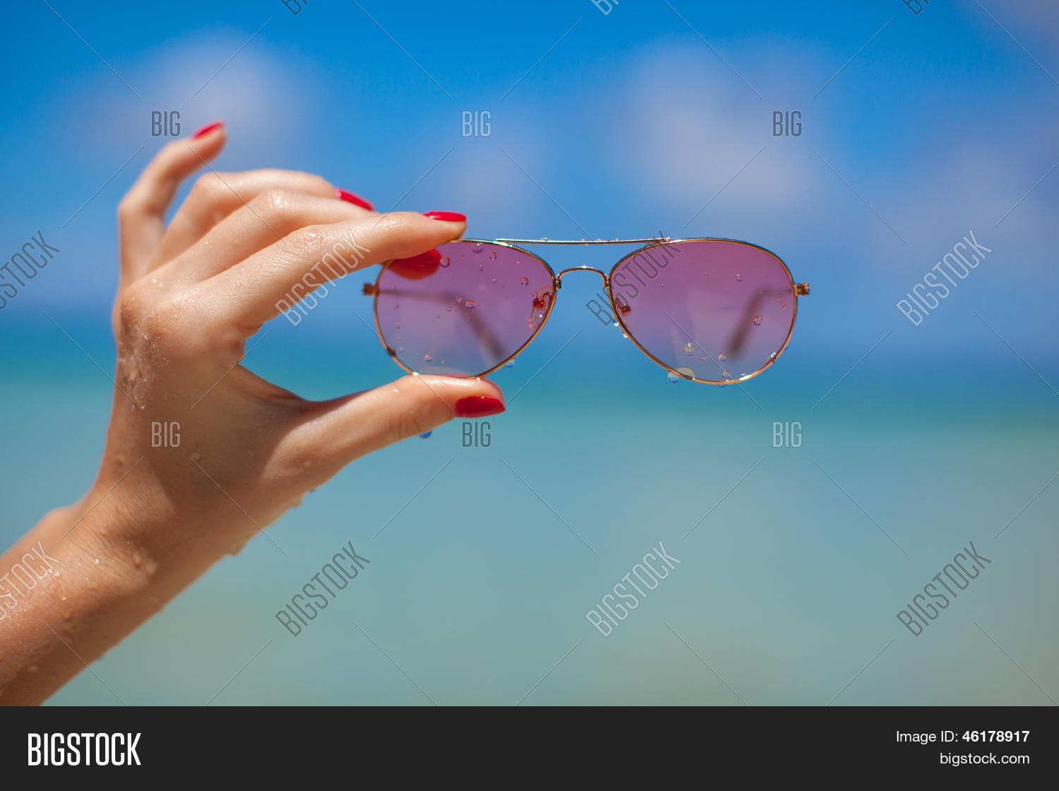 Womans Hand Holding Sunglasses On Image And Photo Bigstock