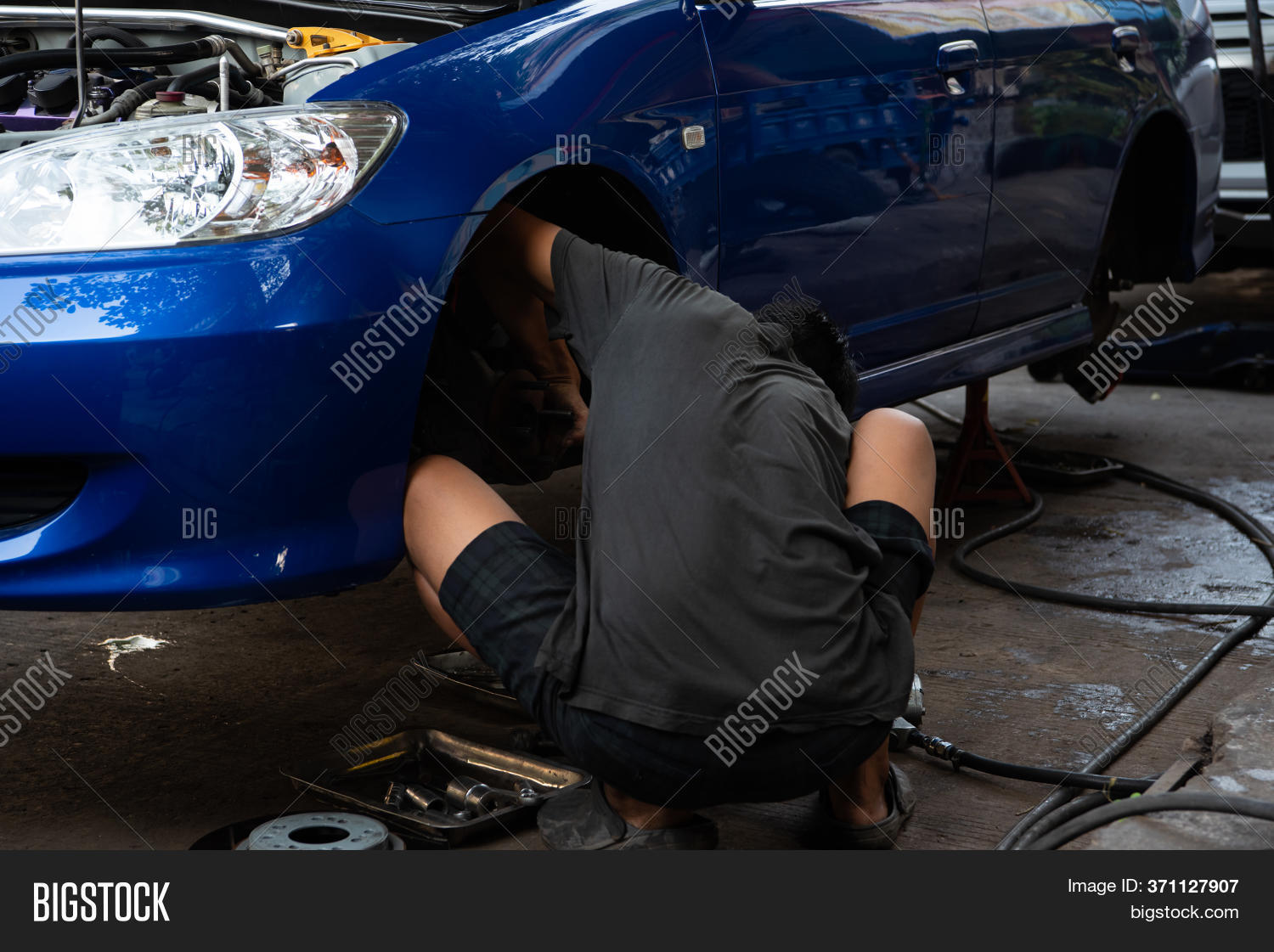 Checking Car Brake Image & Photo (Free Trial) | Bigstock