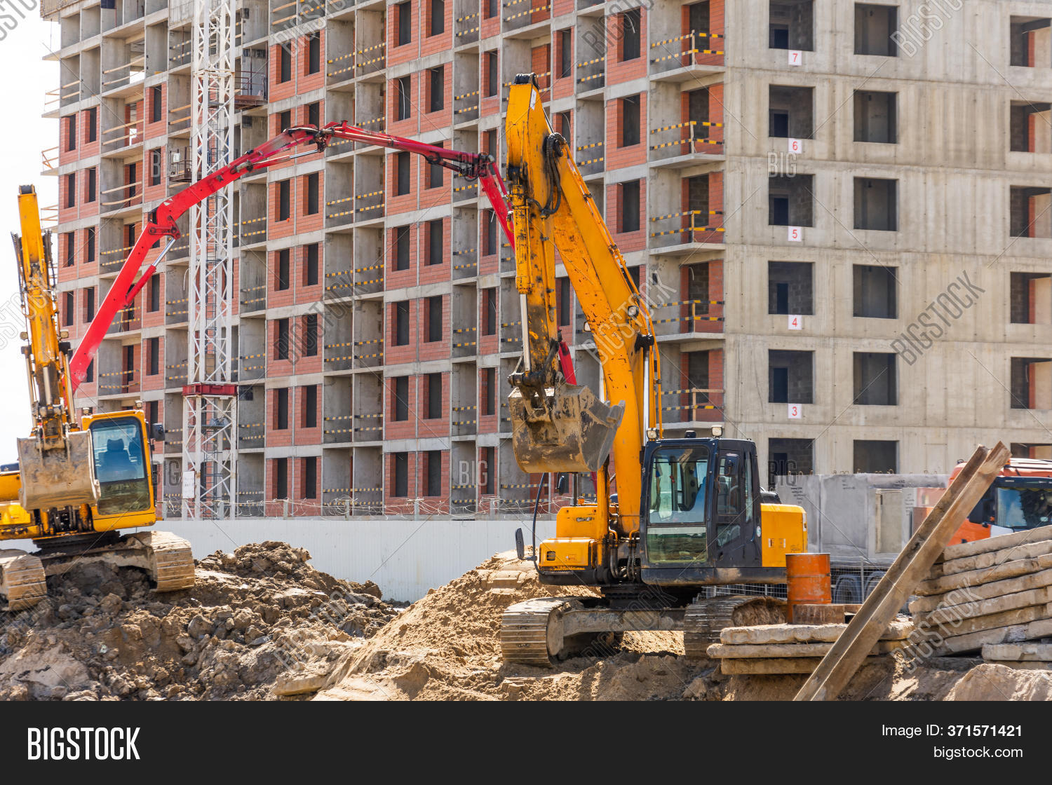 Excavators Raised Image & Photo (Free Trial) | Bigstock