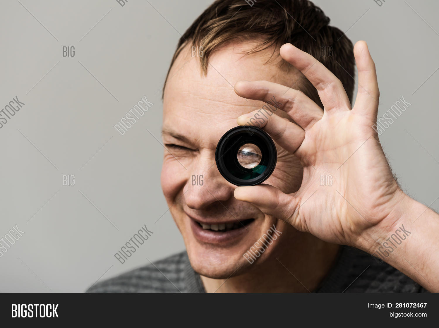 Man Holding Looking Image & Photo (Free Trial) | Bigstock