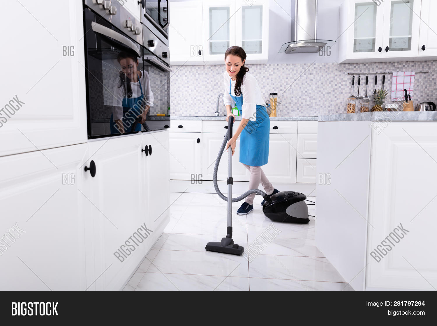 Young Female Janitor Image & Photo (Free Trial) | Bigstock