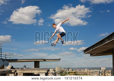 Man Jumping Roof Roof Image & Photo (Free Trial) | Bigstock