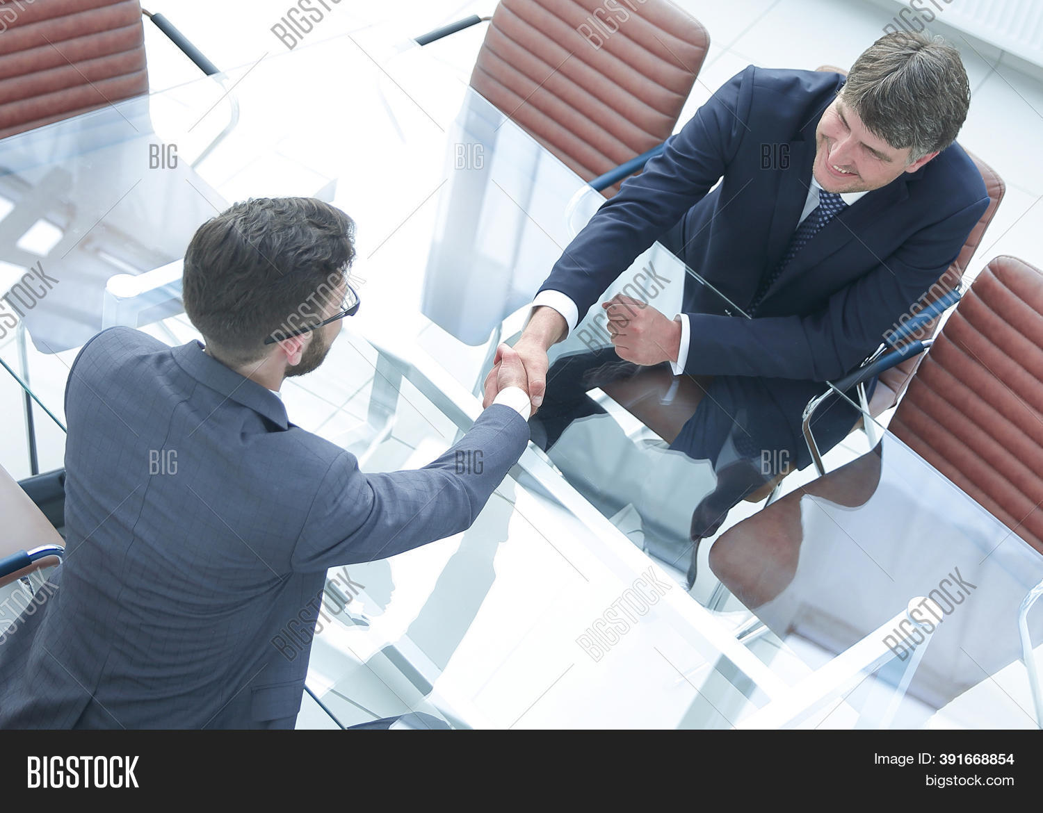 Handshake Across Table Image & Photo (Free Trial) | Bigstock