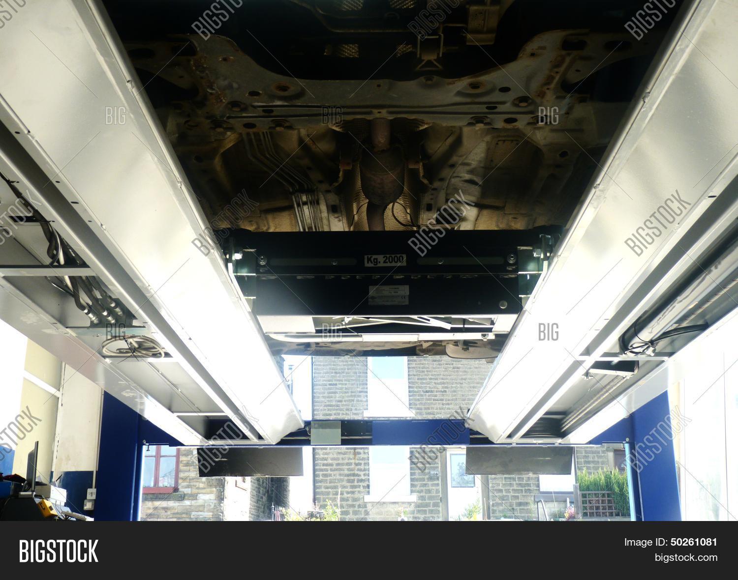 Working Under Car Lift Image & Photo (Free Trial) | Bigstock