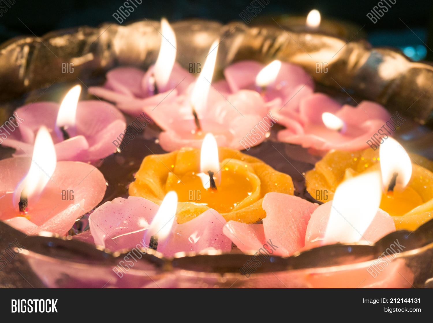 Beautiful Candles In Water