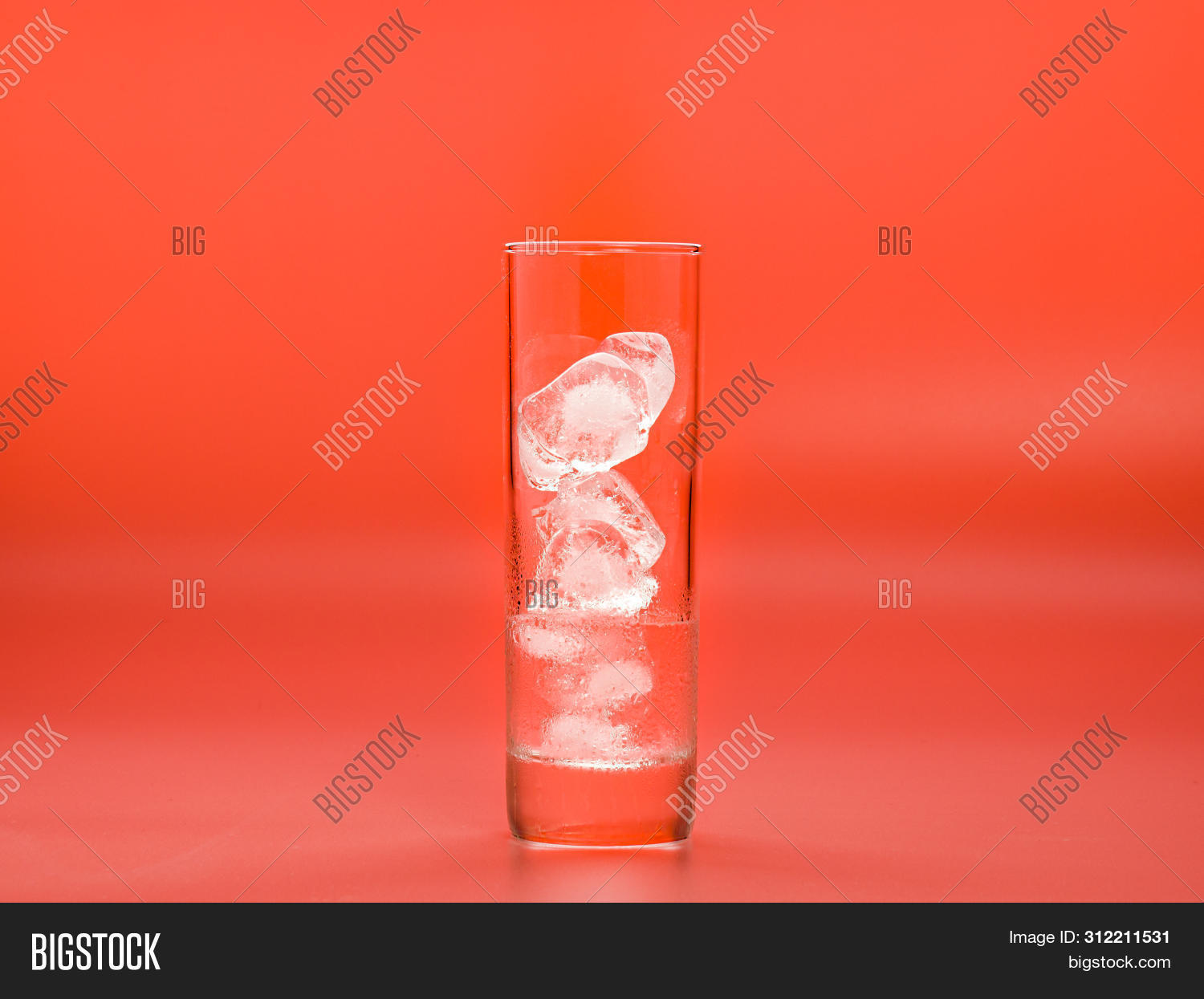 Ice Cubes Melting In Glass