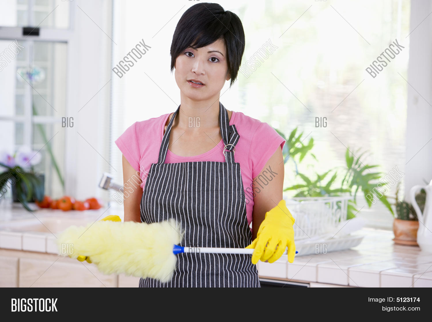 Woman Holding Duster Image & Photo (Free Trial) | Bigstock