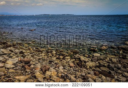 Stones Beach On Blue Image & Photo (Free Trial) | Bigstock