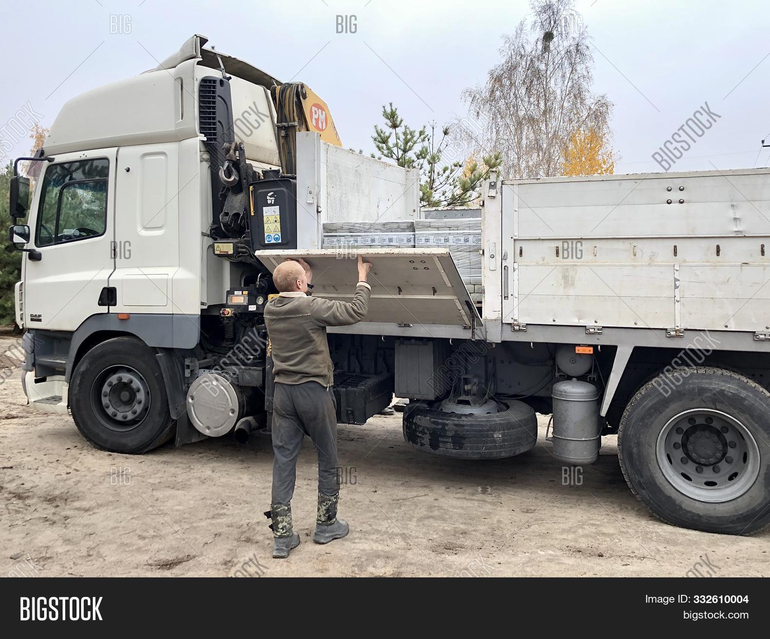 Unloading Paving Slabs Image & Photo (Free Trial) | Bigstock