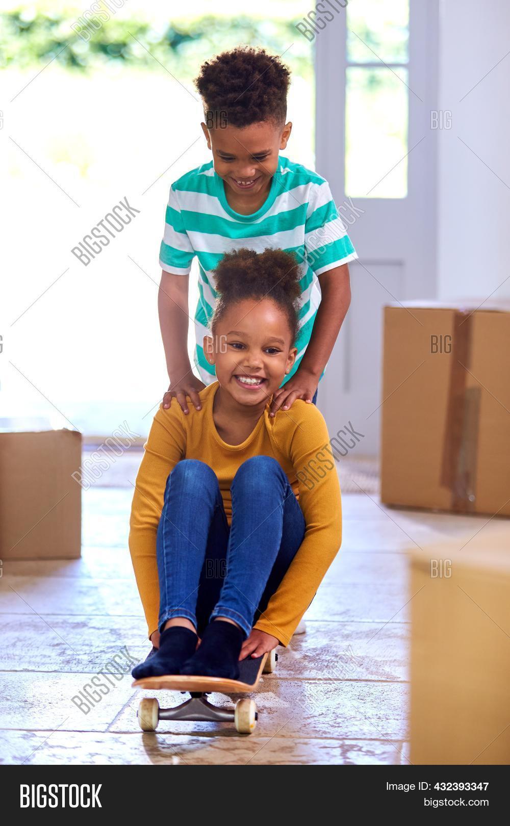 Two Children Boxes On Image & Photo (Free Trial) | Bigstock