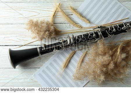 Сlarinet, Music Sheets And Reeds On White Wooden Table - Stock Image ...