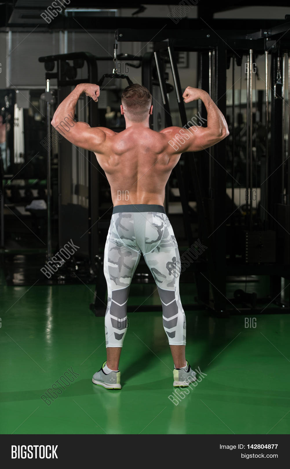 Muscular Man Flexing Image & Photo (Free Trial) | Bigstock