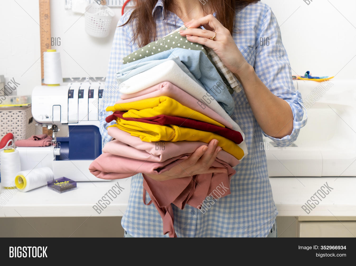 Sewing: Girl Holds Her Image & Photo (Free Trial) | Bigstock
