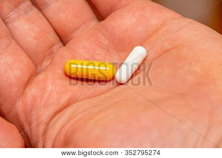 Man Taking Two Pills Image & Photo (Free Trial) | Bigstock