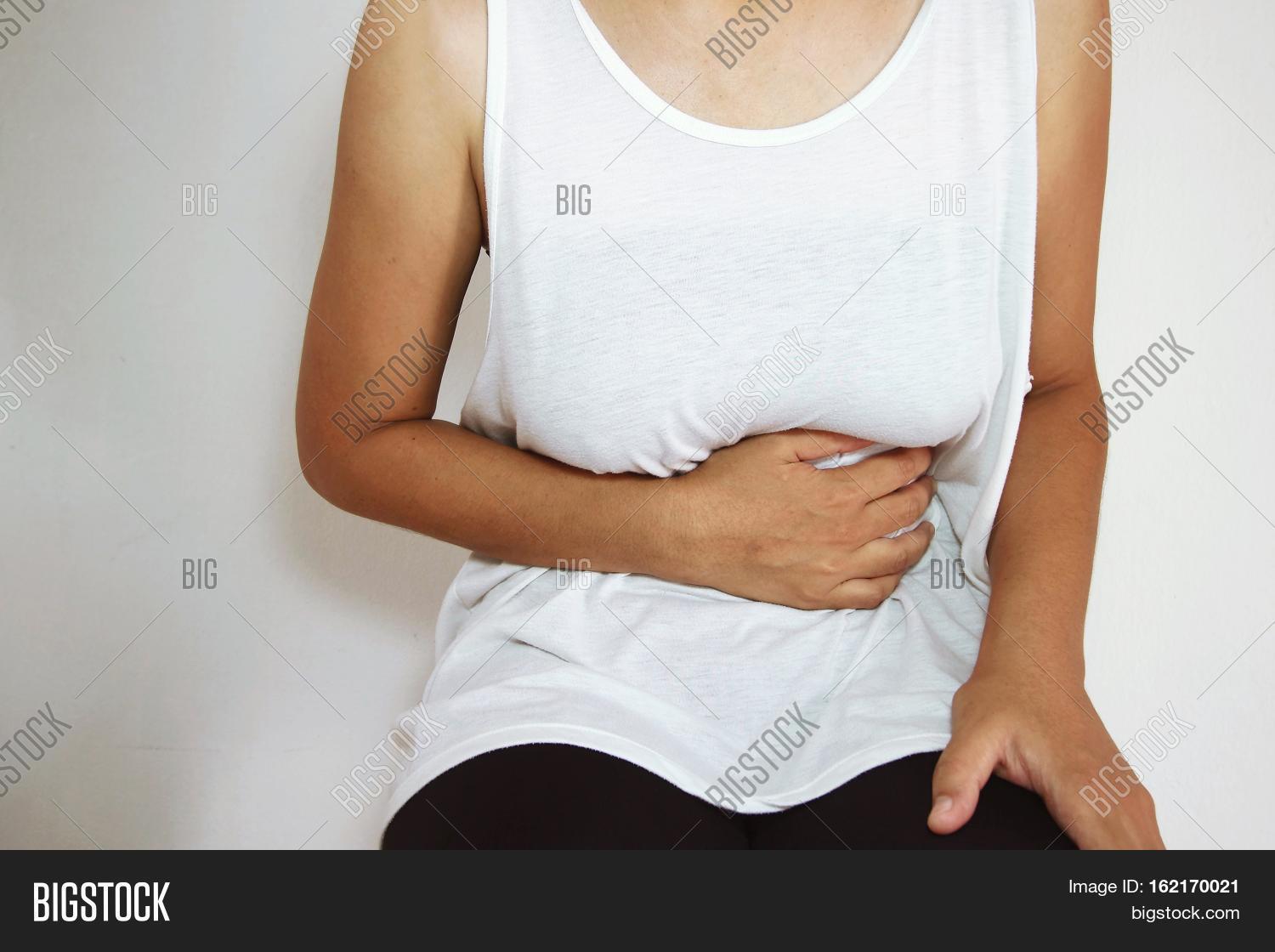 Woman Stomach Ache Image & Photo (Free Trial) | Bigstock