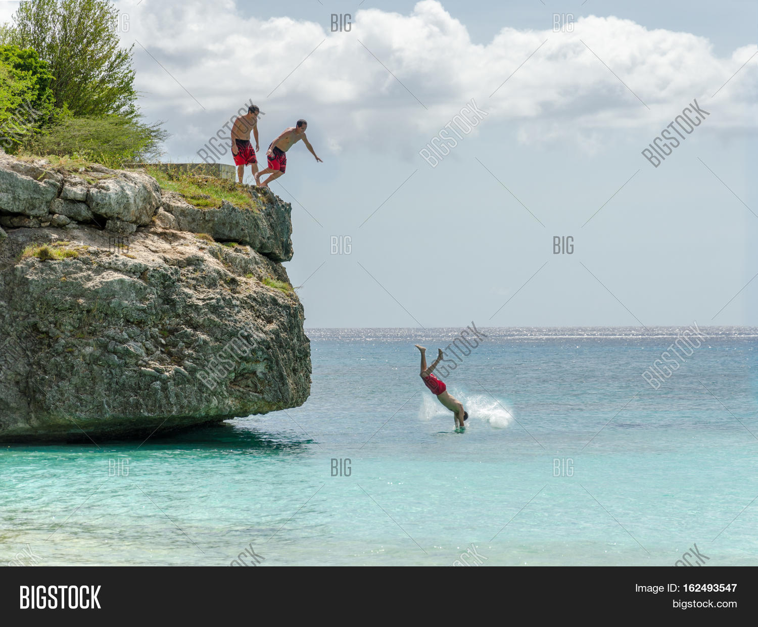 Tourist Jumping Rock Image & Photo (Free Trial) | Bigstock