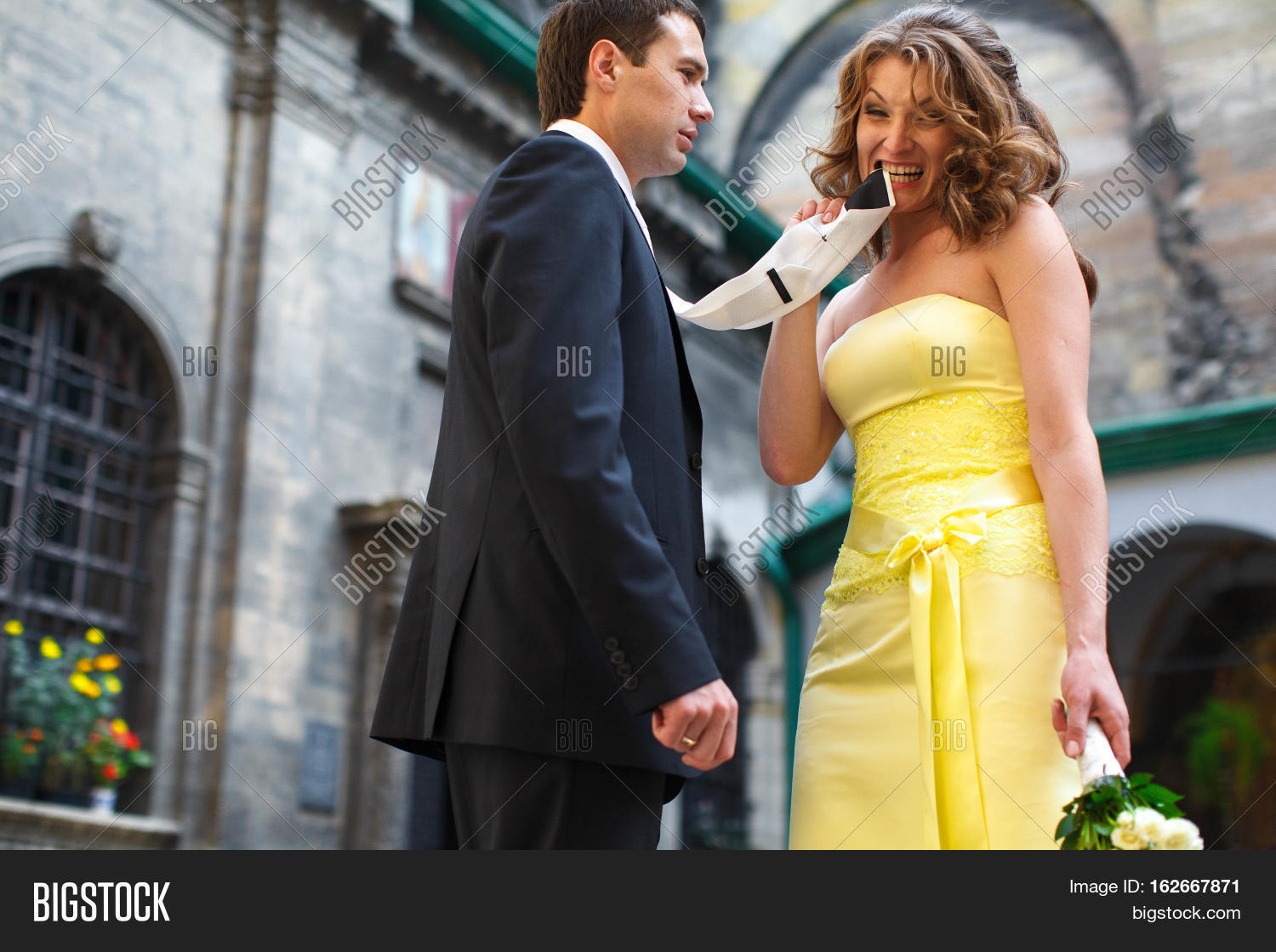 Woman Bites Man's Tie Image & Photo (Free Trial) | Bigstock