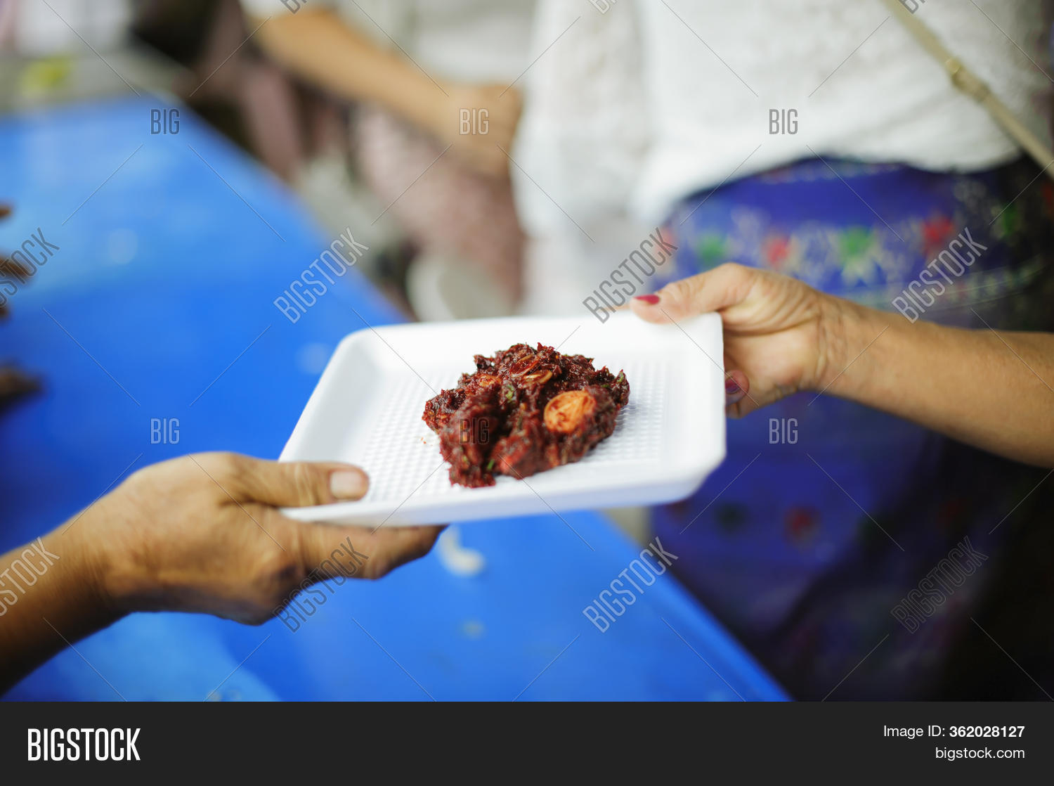 Sharing Food Volunteer Image & Photo (Free Trial) | Bigstock
