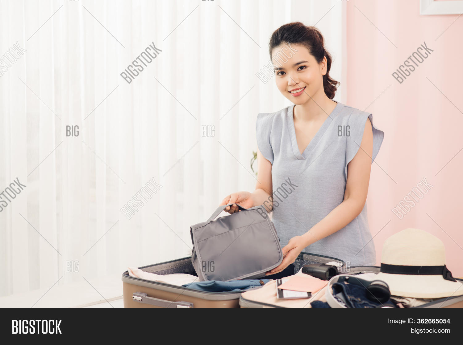 Woman Packing Travel Image & Photo (Free Trial) | Bigstock
