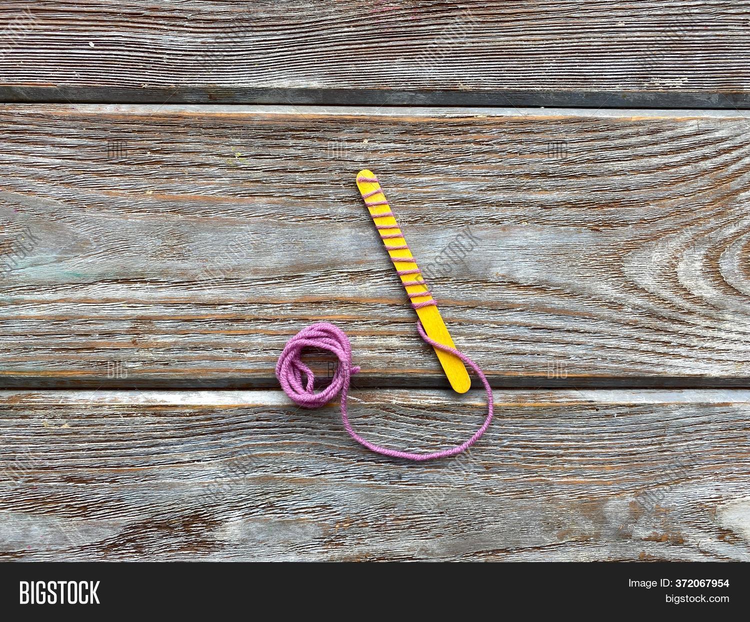 On Yellow Wooden Stick Image & Photo (Free Trial) | Bigstock